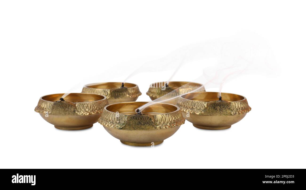 Diya lamps on white background. Diwali celebration Stock Photo - Alamy