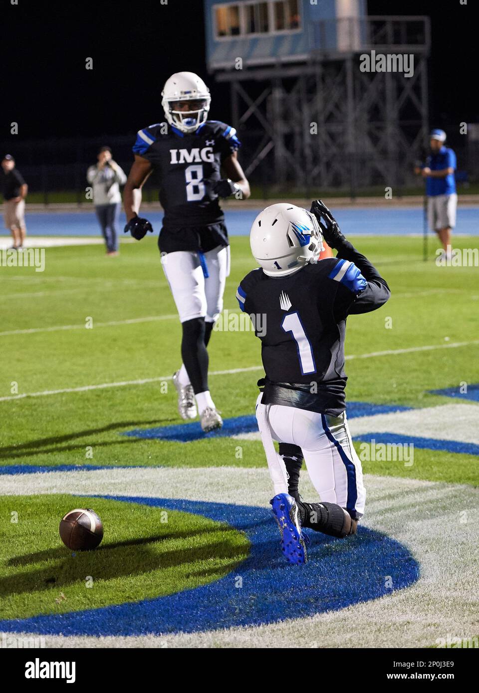 IMG Academy Ascenders Emmanuel Greene (1) takes a knee in prayer after ...