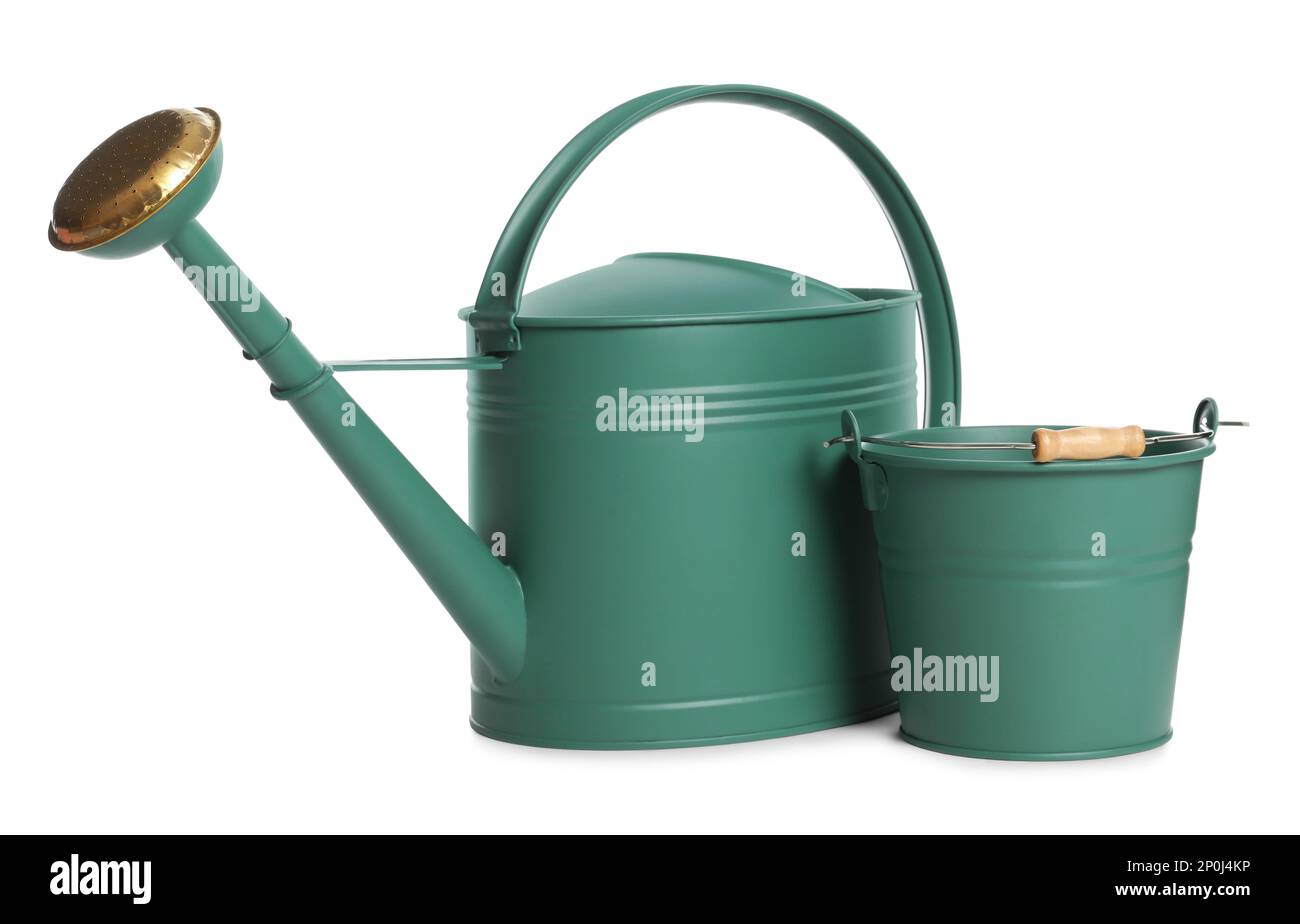 Watering can and bucket on white background Stock Photo - Alamy