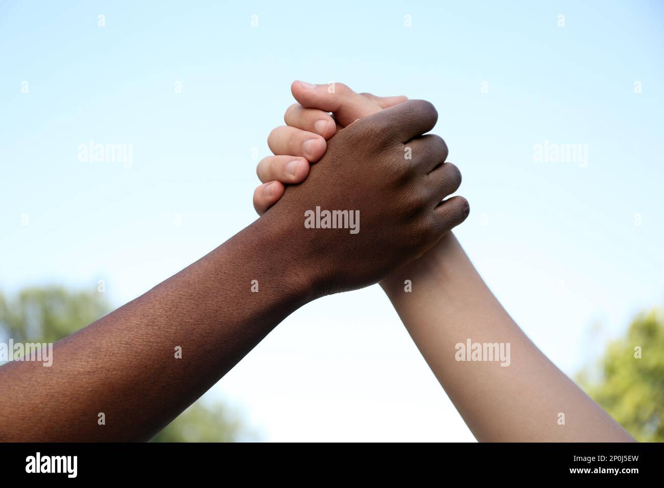 Clasping hands together hi-res stock photography and images - Alamy