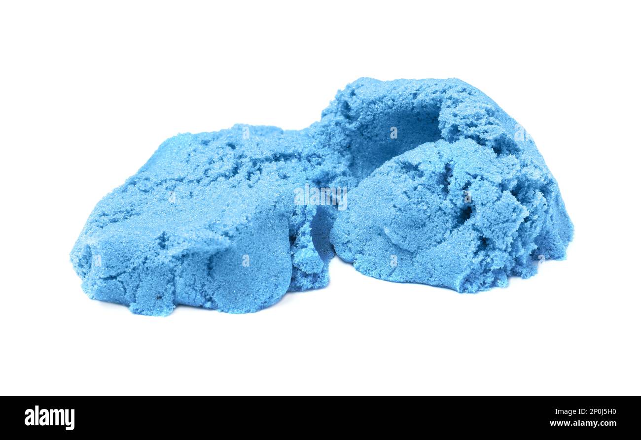 Pile of blue kinetic sand on white background Stock Photo - Alamy