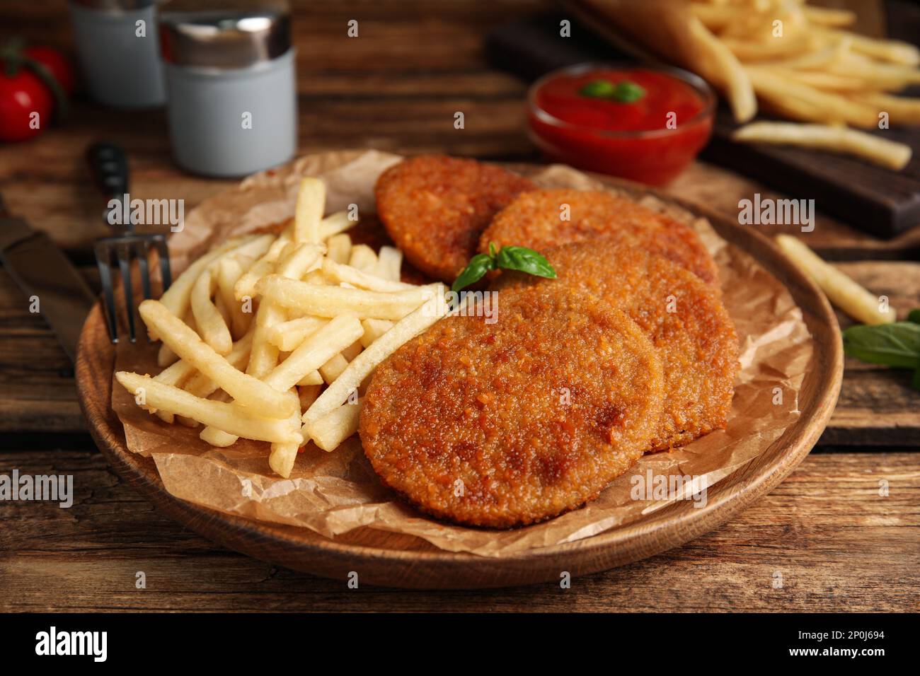 Breaded chicken schnitzel served hi-res stock photography and images ...
