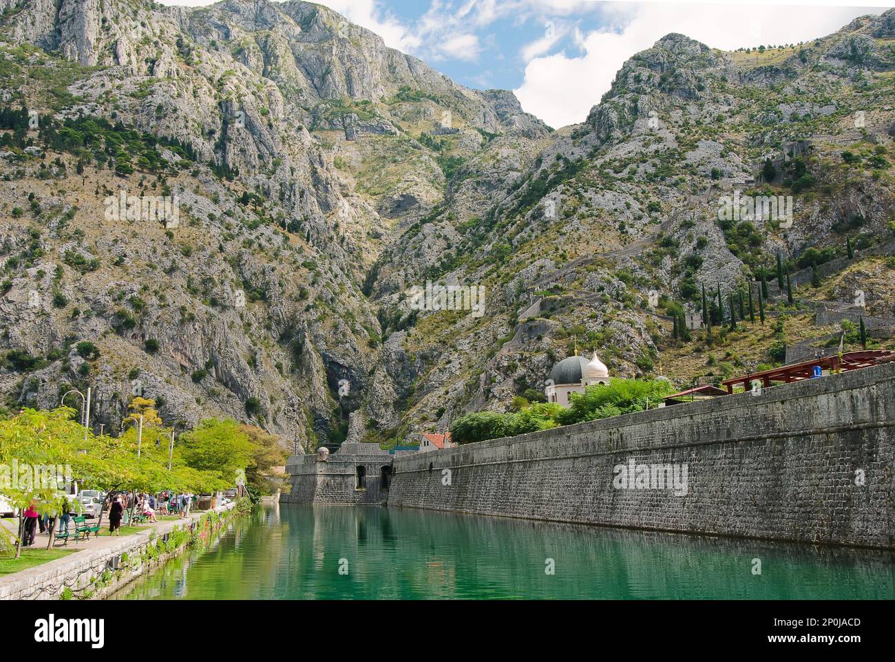 The view to the Kotor city walls from the river side in Montenegro ...