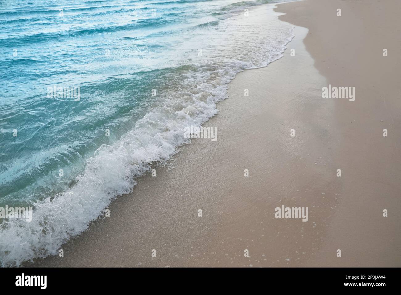 Blue waves rolling onto island hi-res stock photography and images - Alamy