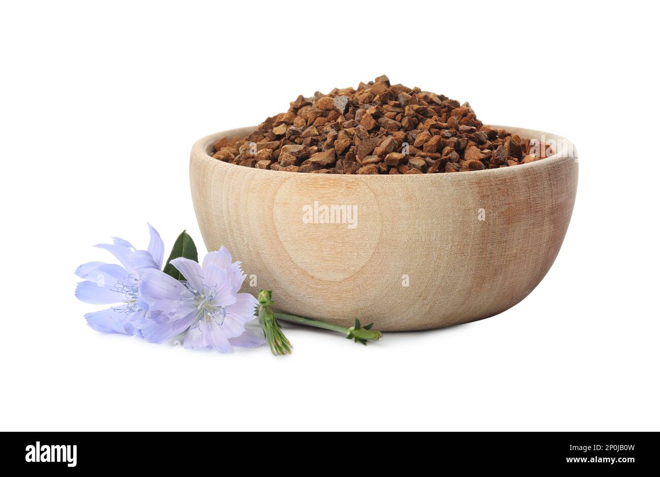 Bowl of chicory granules and flowers on white background Stock Photo ...