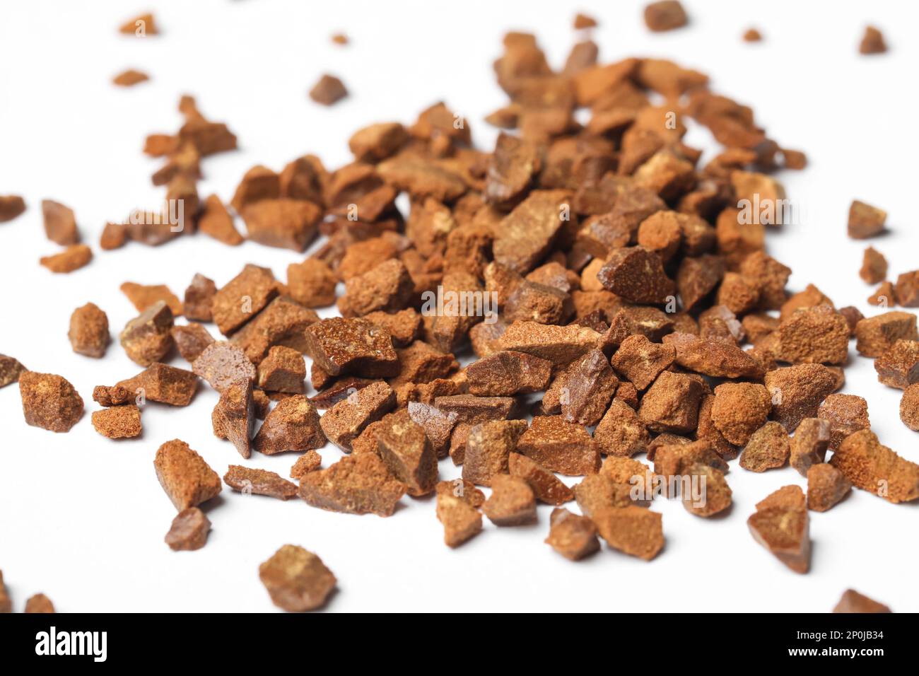 Pile of chicory granules on white background, closeup Stock Photo - Alamy