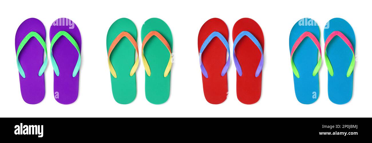 Set with different colorful flip flops on white background, top view ...
