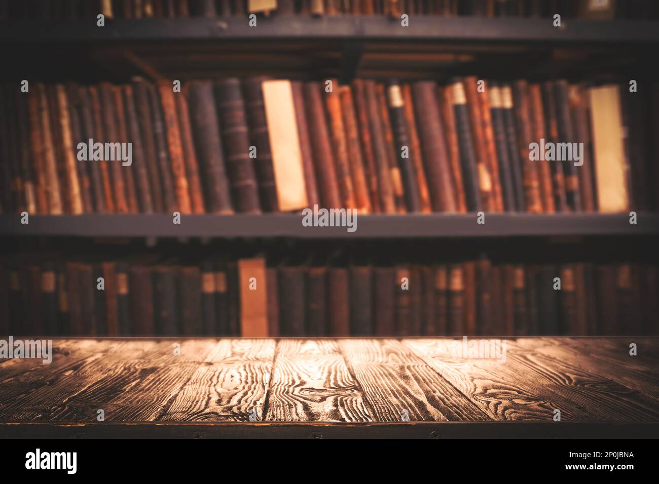Empty wooden table in library. Space for design Stock Photo - Alamy