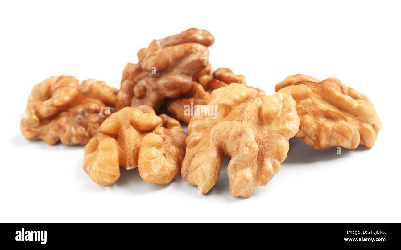 Pile of peeled walnuts on white background Stock Photo - Alamy