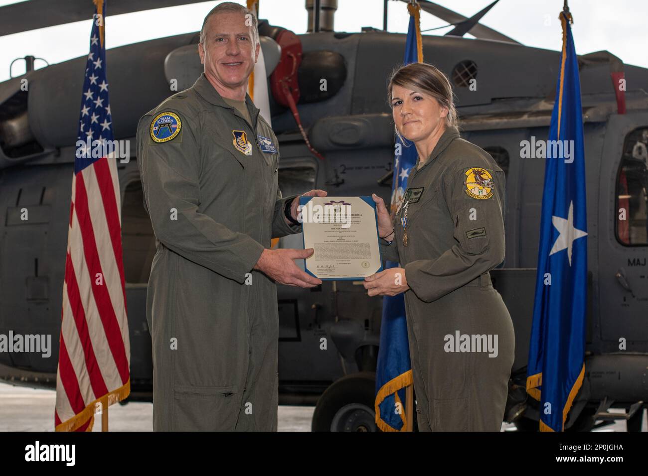 U.S. Air Force Brig. Gen. David Eaglin, left, 18th Wing commander, presents the Air Medal with ...