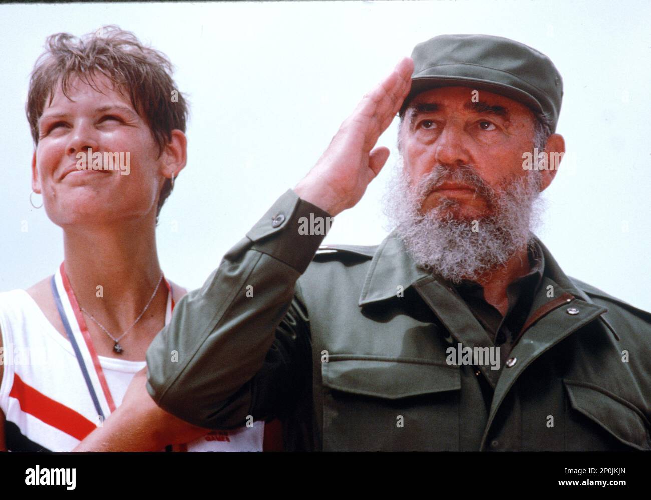 Former Cuban Prime Minister Fidel Castro salutes the American Flag ...