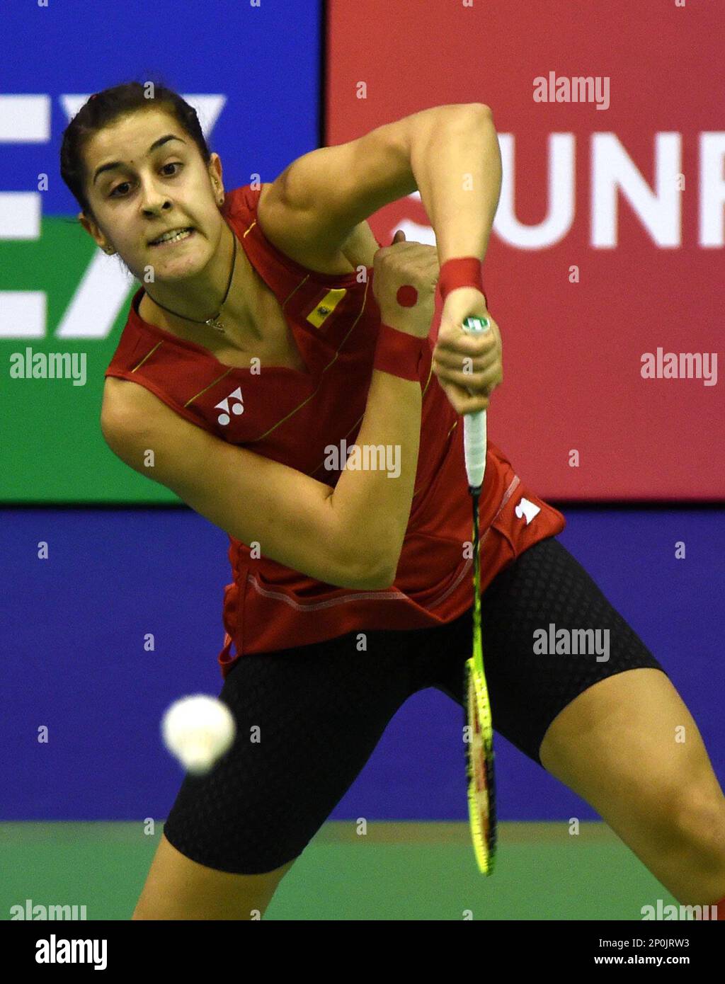 Carolina Marin of Spain plays a return shot to Yip Pui-yin of Hong Kong ...