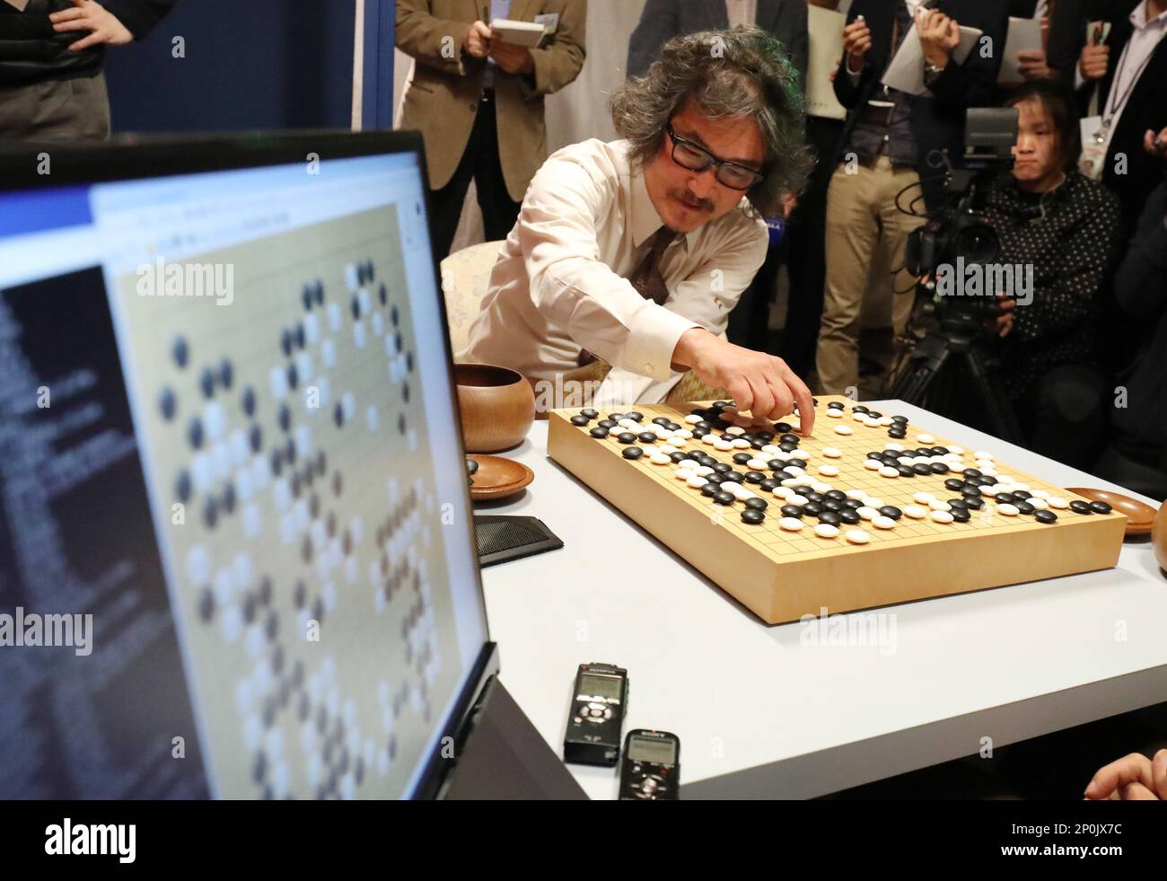 Cho Chinkun(C), 60-year-old professional Go master reflects on the game ...