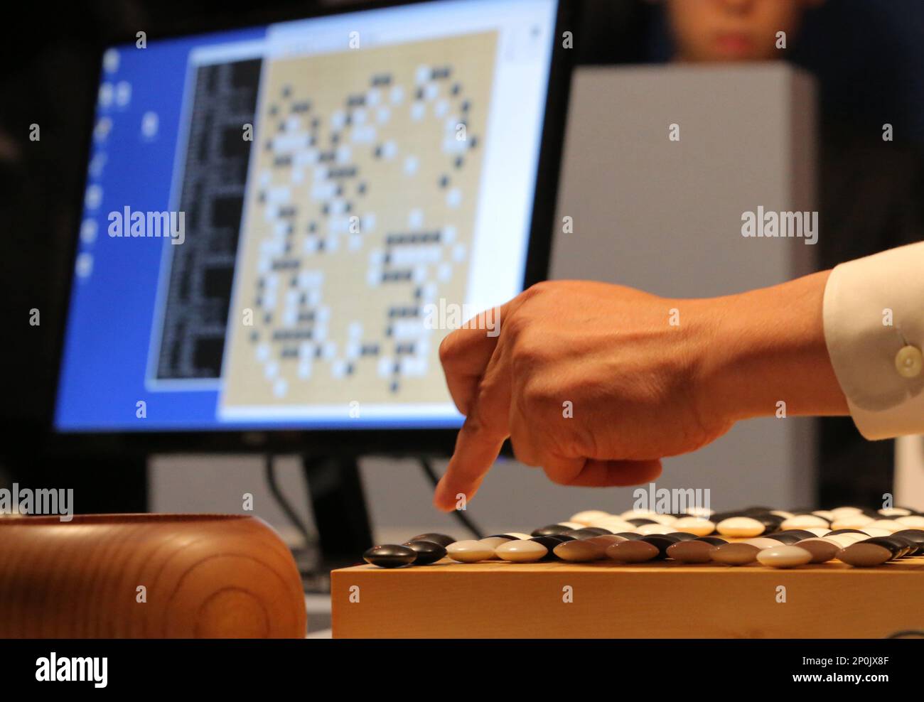 A photo shows DeepZenGo(L),Japanese artificial intelligence program ...