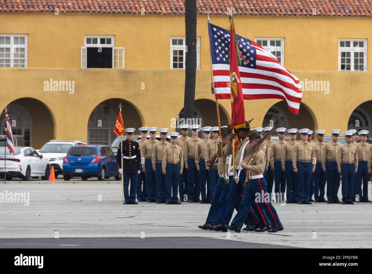 U.S. Marines with the Regimental Color Guard march during the ...