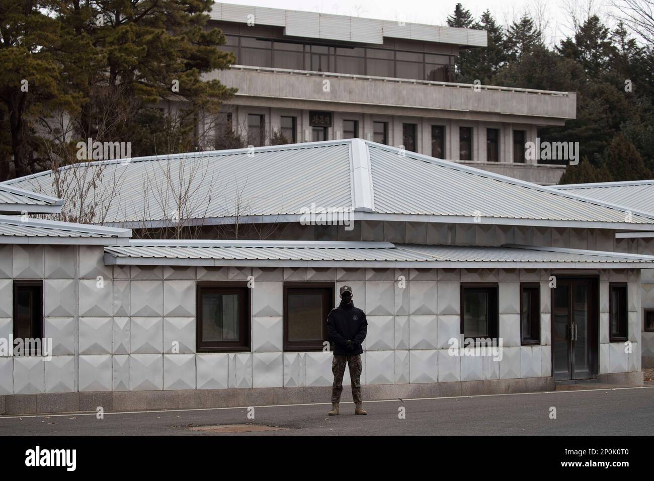 A South Korean soldier stands guard during a media tour at the Joint ...