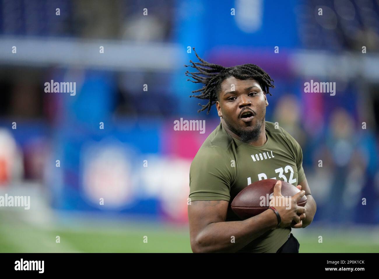 Mississippi State linebacker Tyrus Wheat runs a drill at the NFL ...