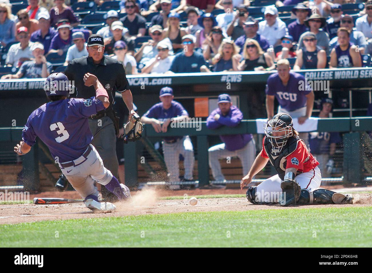 Texas Tech Red Raiders catcher Tyler Floyd (16) reaches for the ball as ...