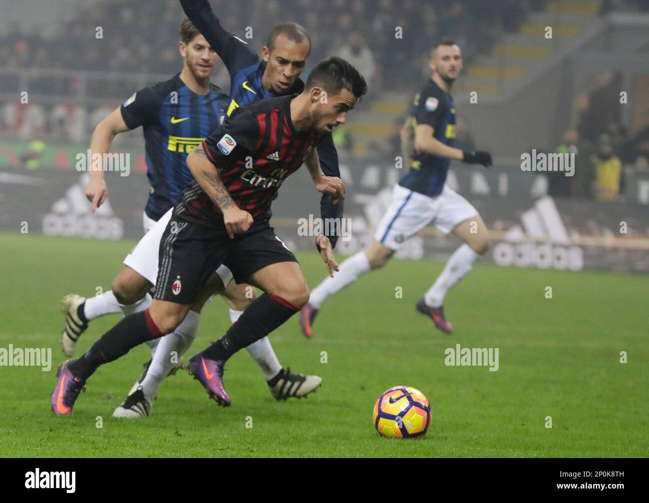 AC Milan's Suso, center, scores during a Serie A soccer match between ...