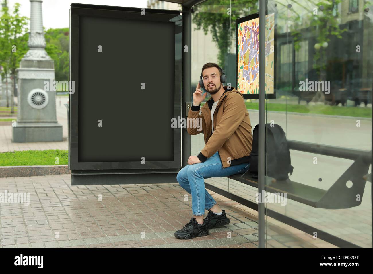 Man headphones public transport hi-res stock photography and images - Alamy