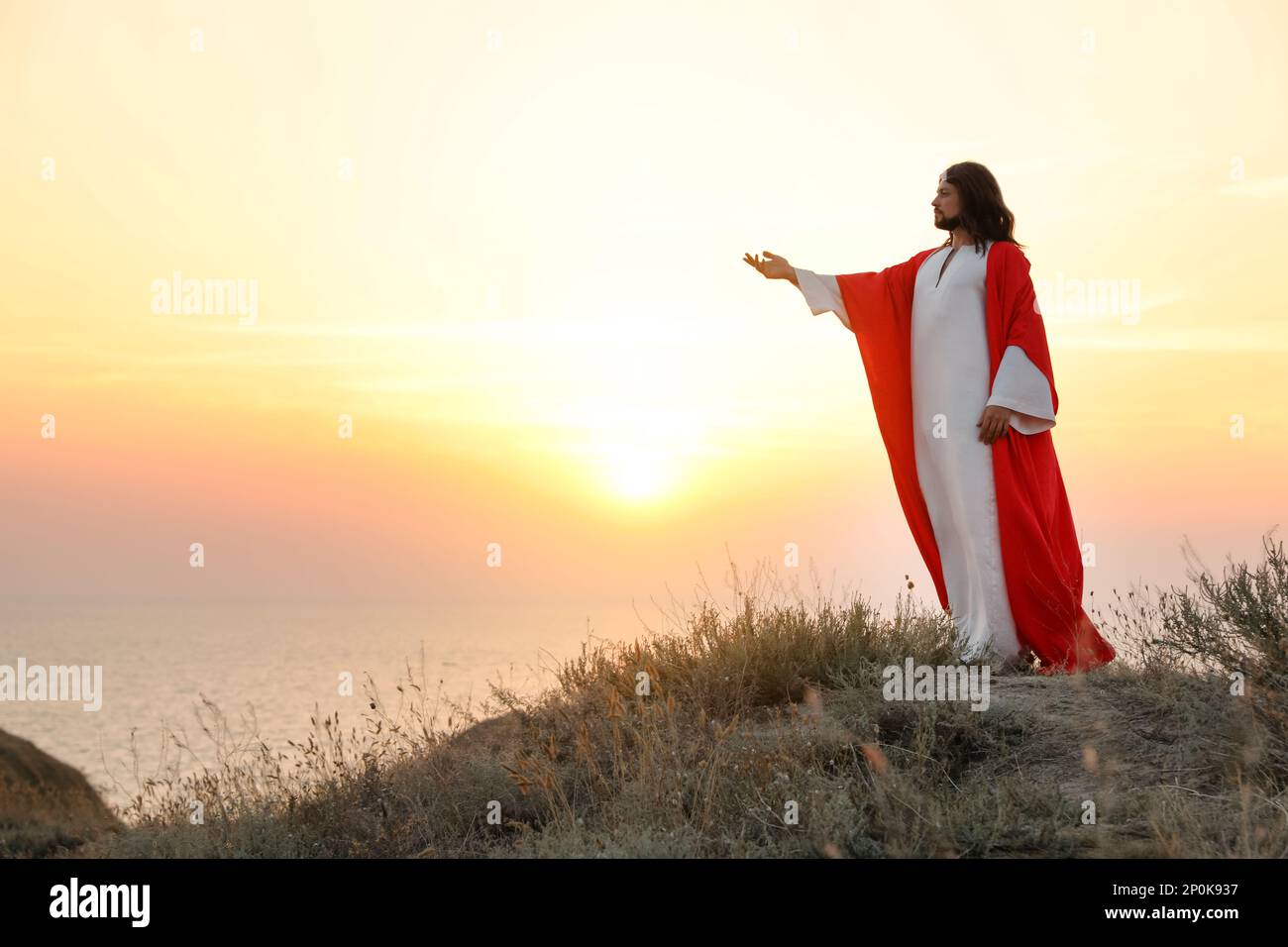 Jesus raising hand hi-res stock photography and images - Alamy