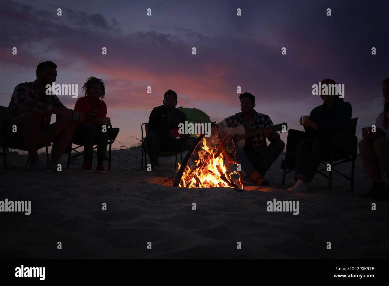 Gathering around fireplace hi-res stock photography and images - Alamy