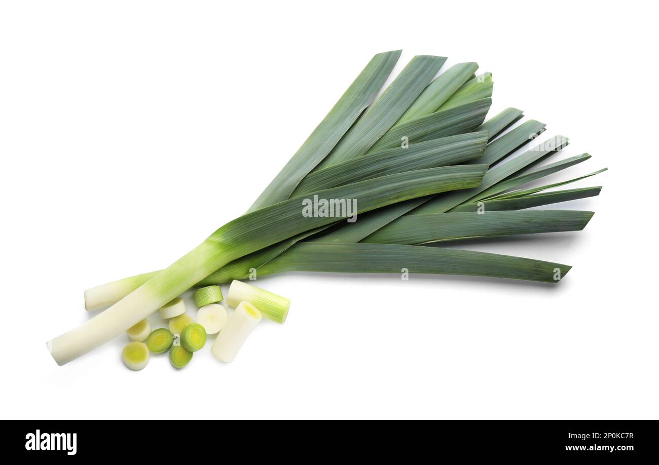 Whole and cut fresh leeks on white background Stock Photo - Alamy