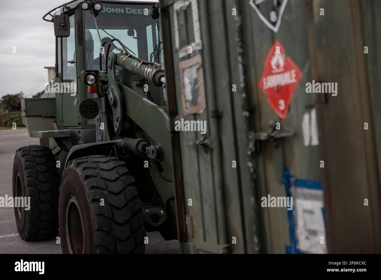 U.S. Marine Corps Lance Cpl. PhyoPyae Thura, an engineer equipment ...