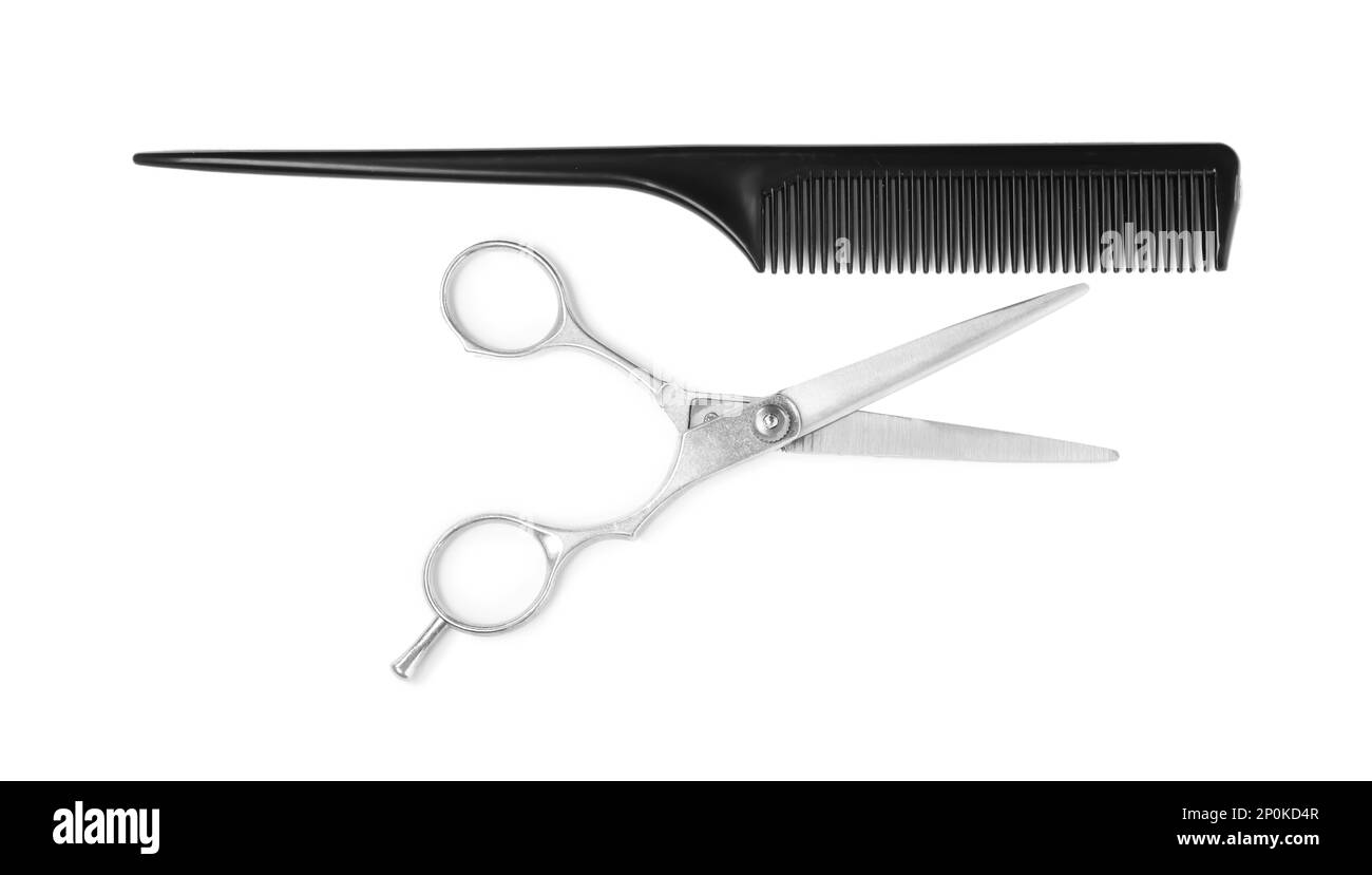 Professional hairdresser scissors and black comb isolated on white, top ...