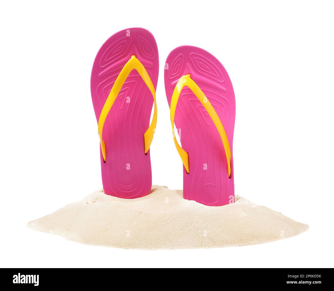 Pink flip flops in sand on white background Stock Photo - Alamy