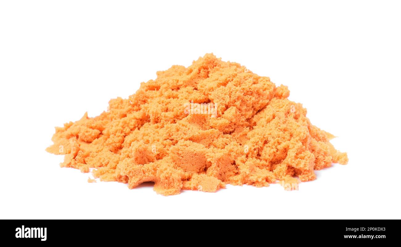 Pile of orange kinetic sand on white background Stock Photo - Alamy
