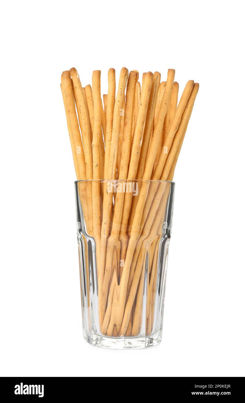 Delicious grissini sticks in glass on white background Stock Photo - Alamy