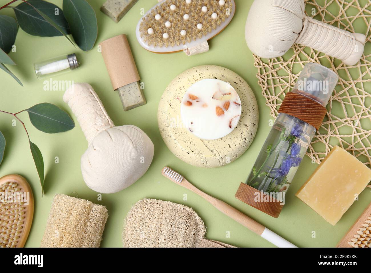 Eco friendly personal care products on light green background, flat lay ...