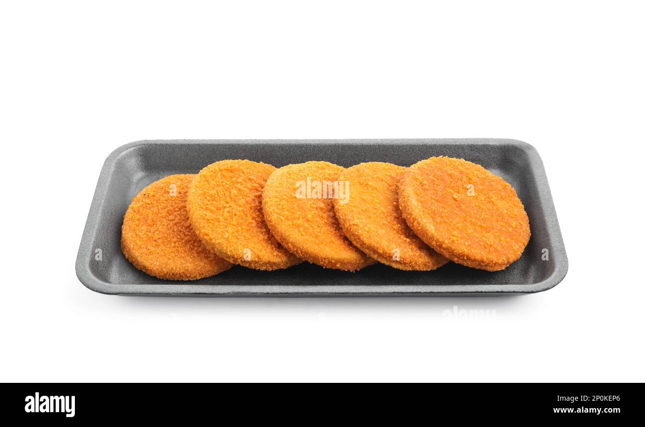 Uncooked breaded cutlets on white background. Freshly frozen semi ...