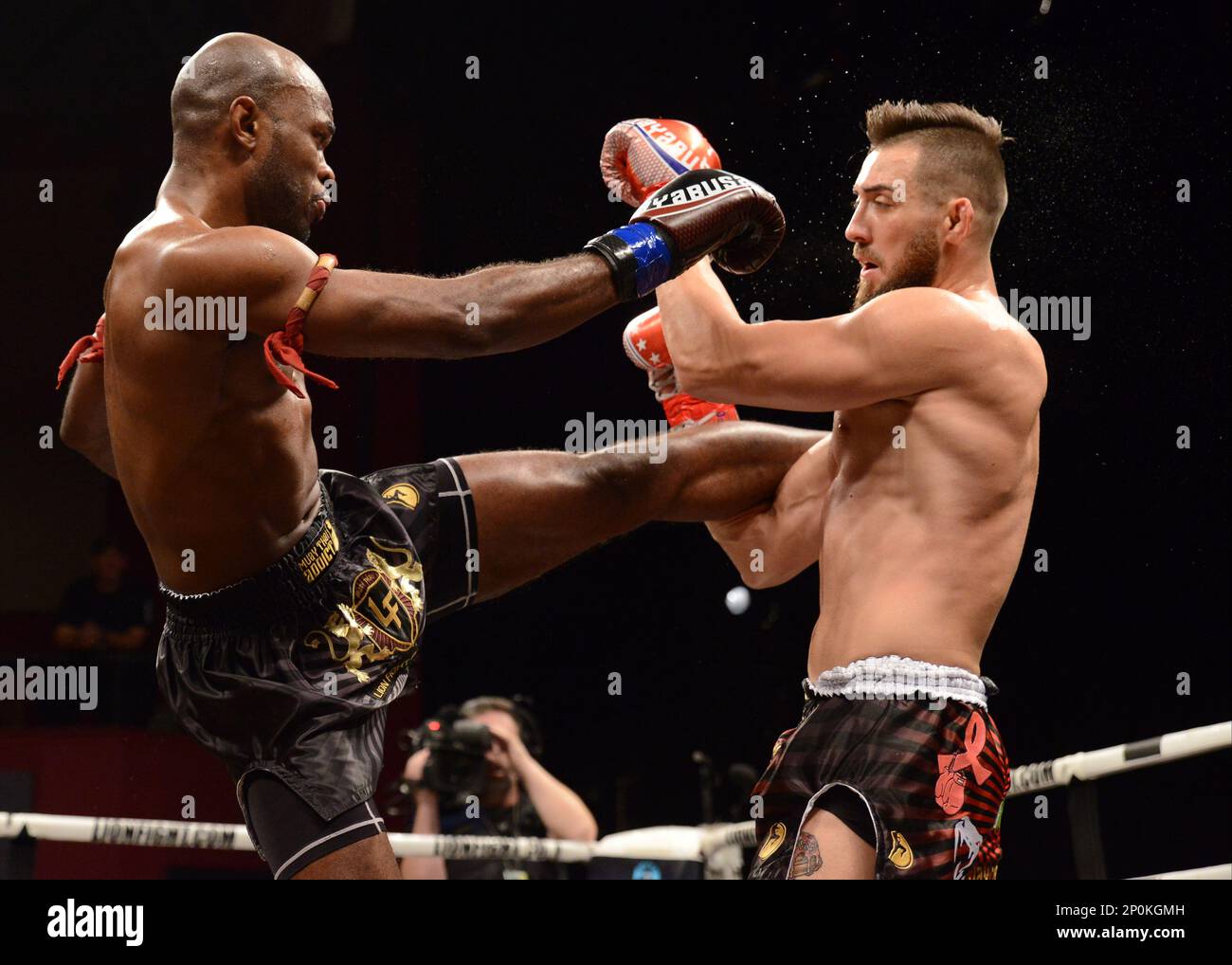 MASHANTUCKET, CT - NOVEMBER 18: PJ Sweda (red gloves) battles Andres ...