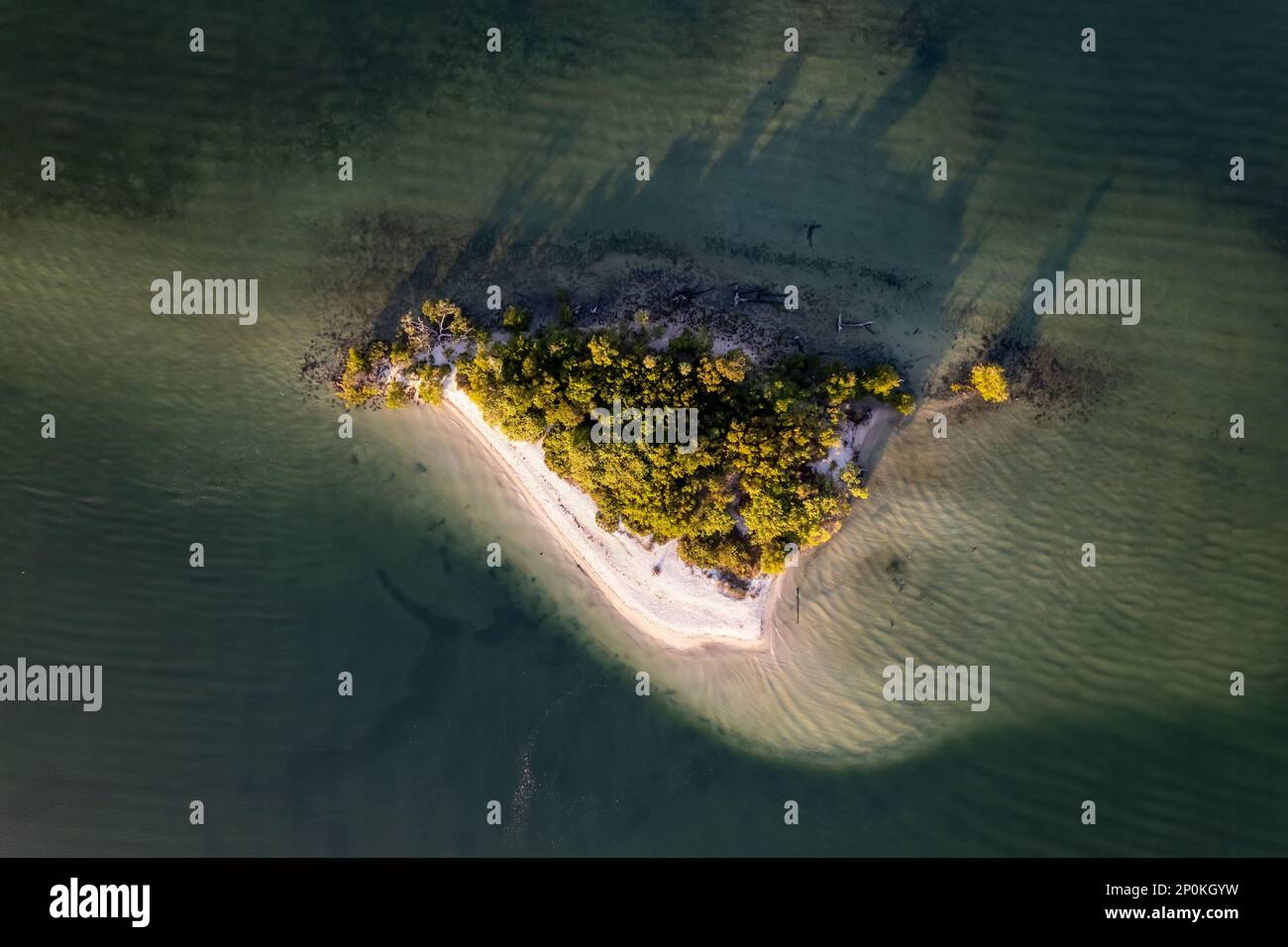 An aerial view of a small island surrounded by waters in North Palm ...