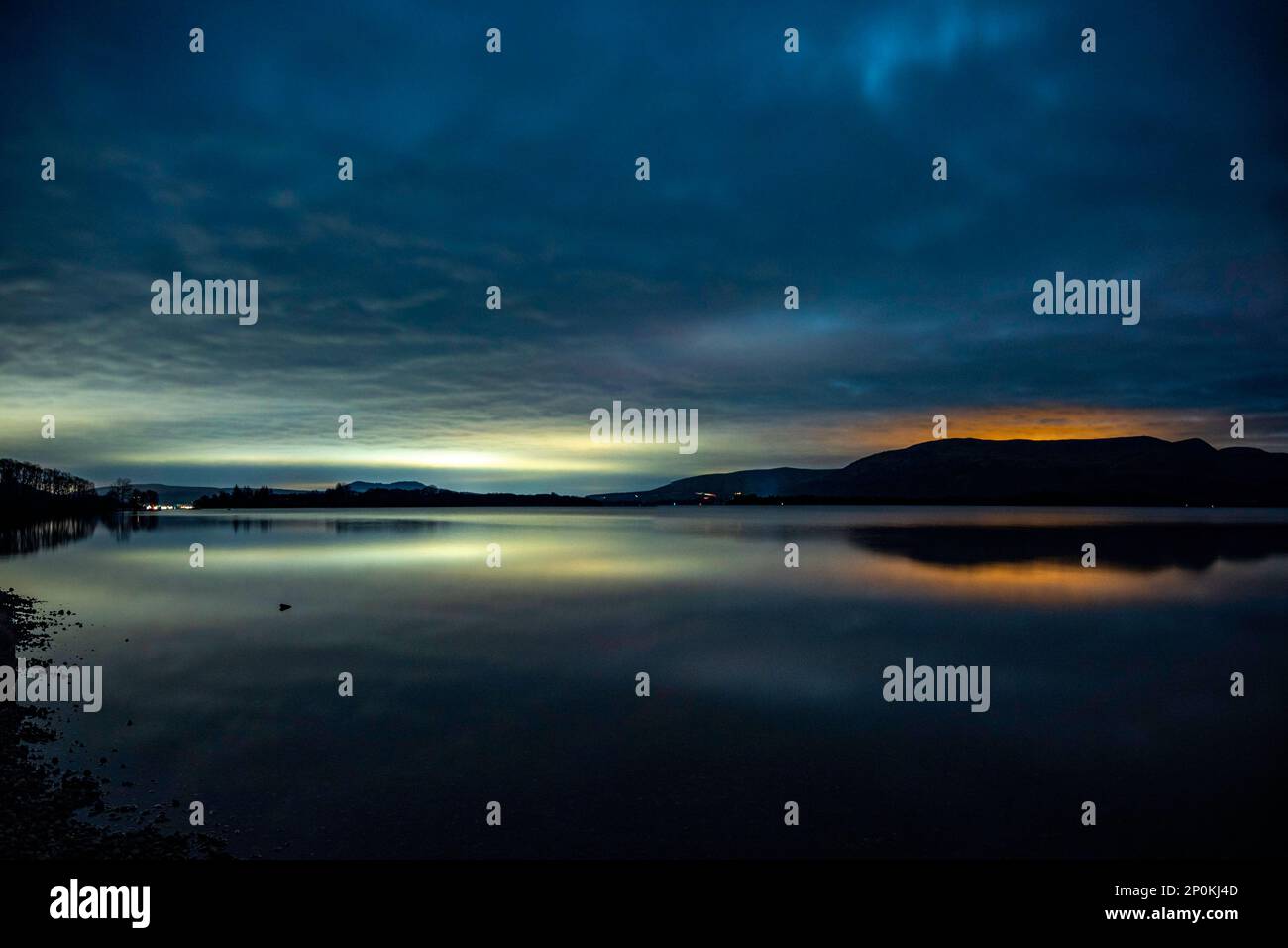 Glow of the northern lights over Loch Lomond & The Trossachs National ...