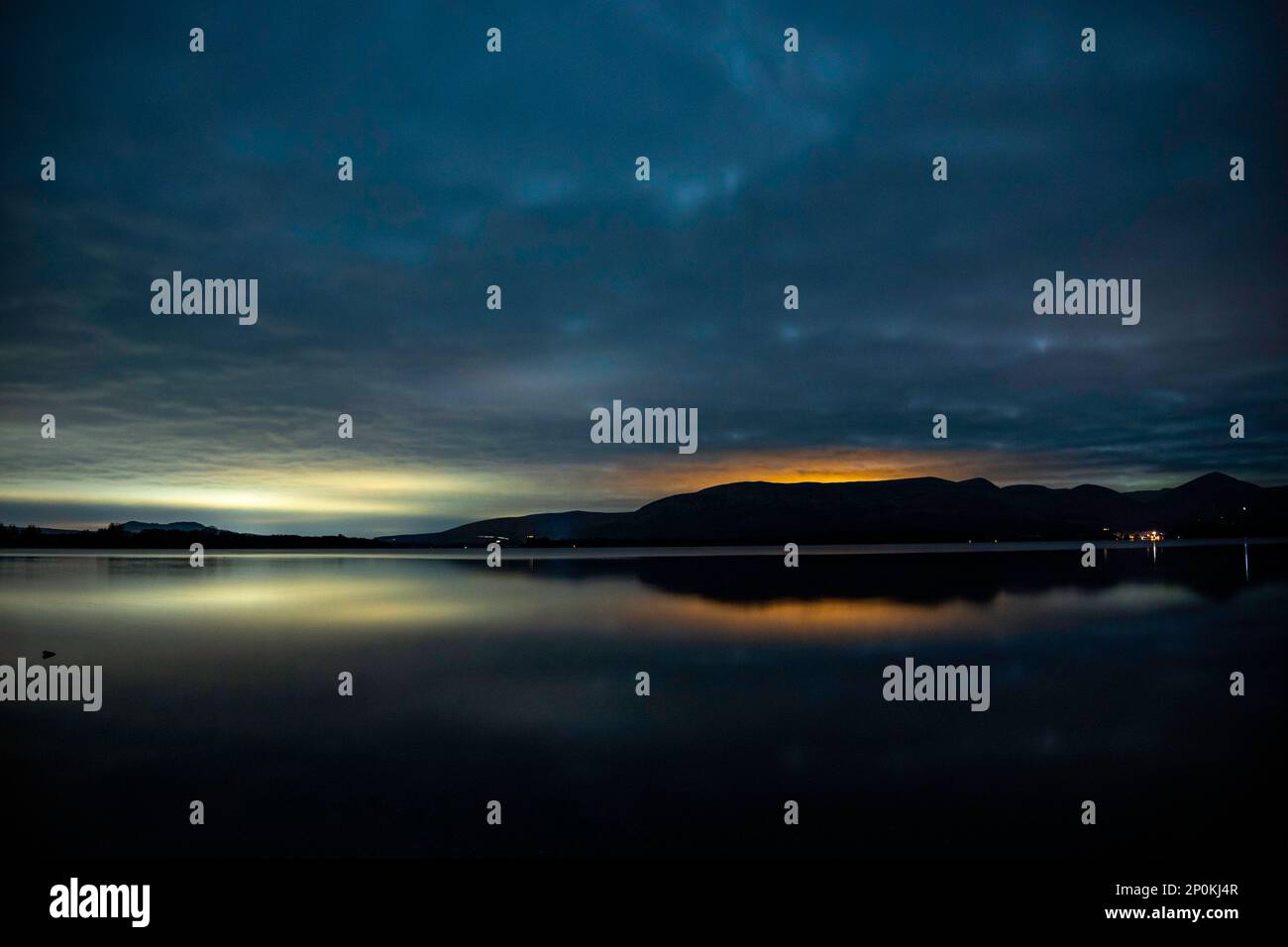 Glow of the northern lights over Loch Lomond & The Trossachs National ...