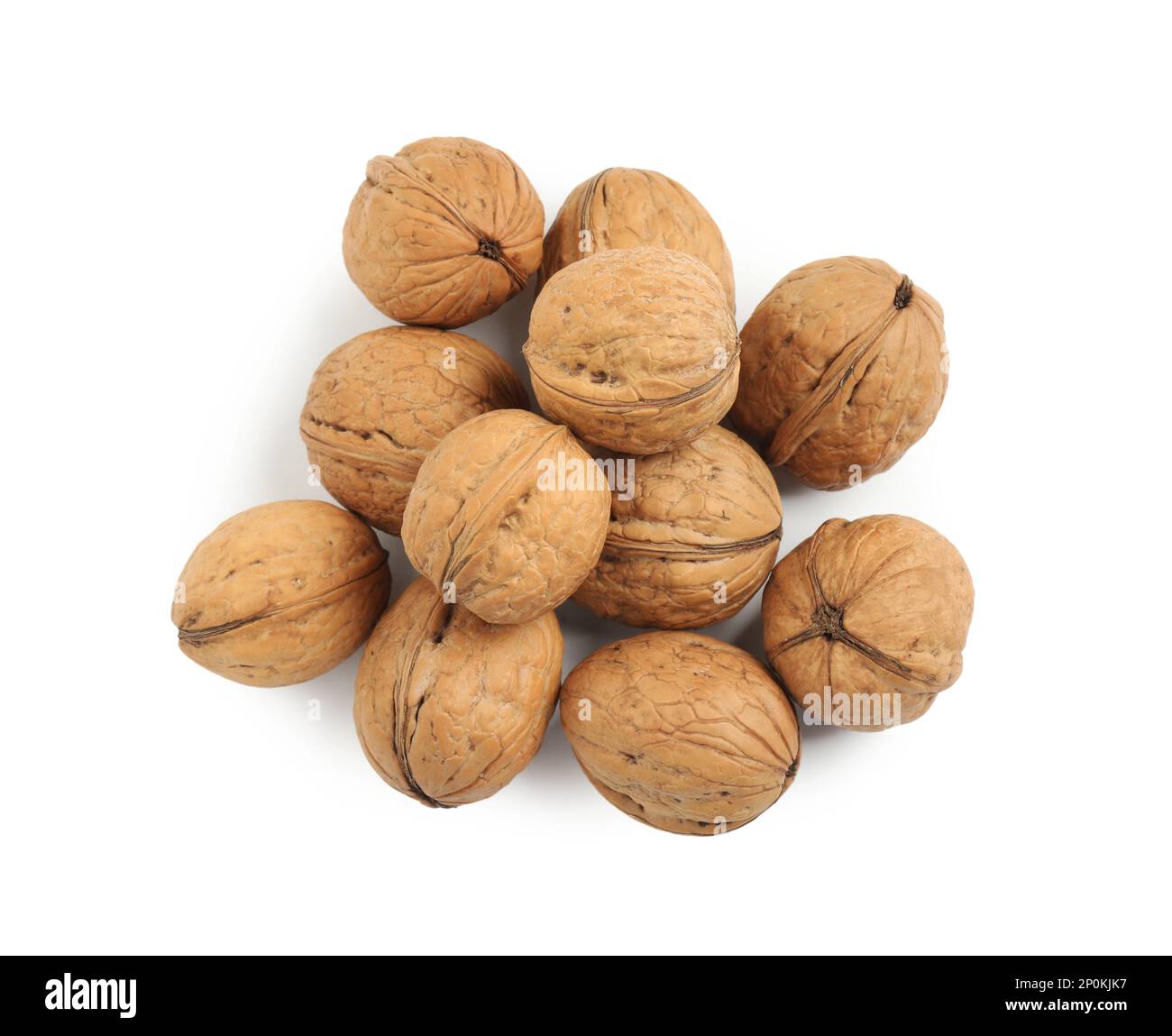 Whole walnuts in shell on white background, top view Stock Photo - Alamy
