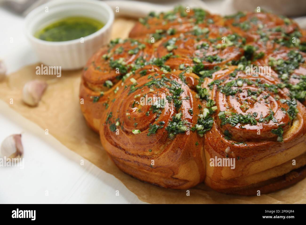 Traditional Ukrainian garlic bread with herbs (Pampushky) on white ...