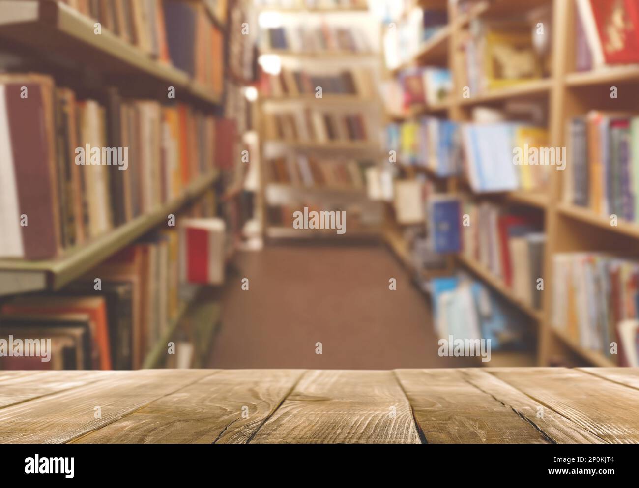 Empty wooden table in library. Space for design Stock Photo - Alamy
