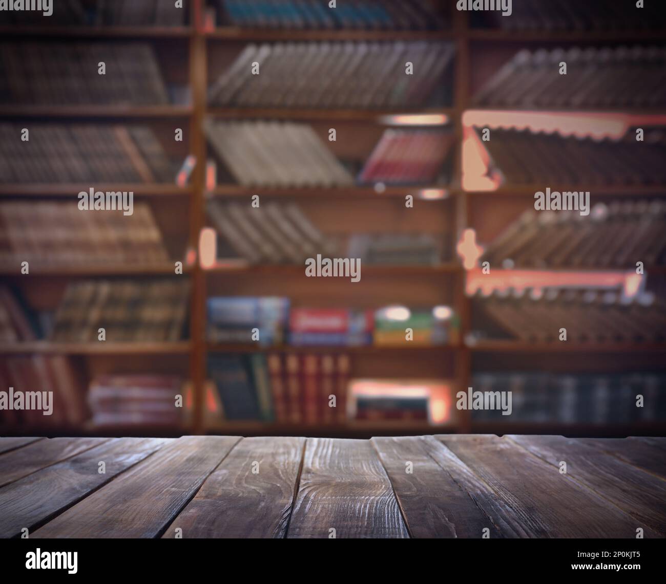 Empty wooden table in library. Space for design Stock Photo - Alamy