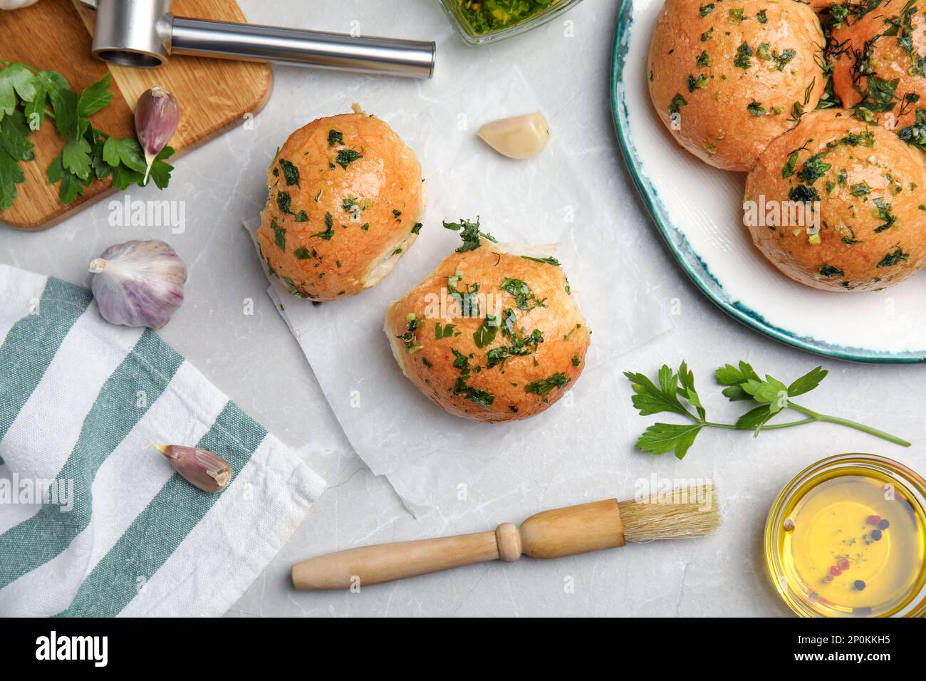 Traditional Ukrainian bread (Pampushky) with garlic on light grey ...