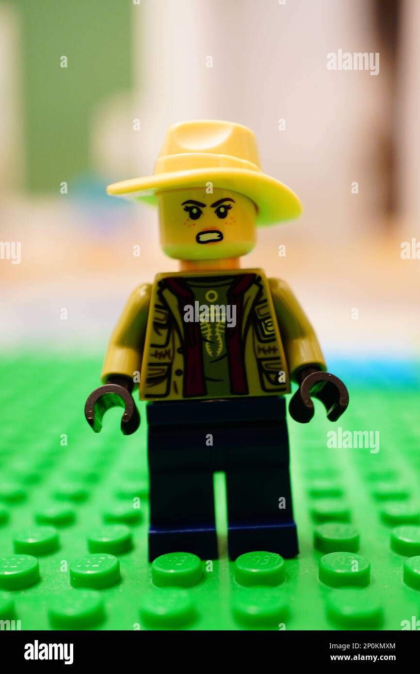 an angry lego figurine in a white cowboy hat Stock Photo - Alamy
