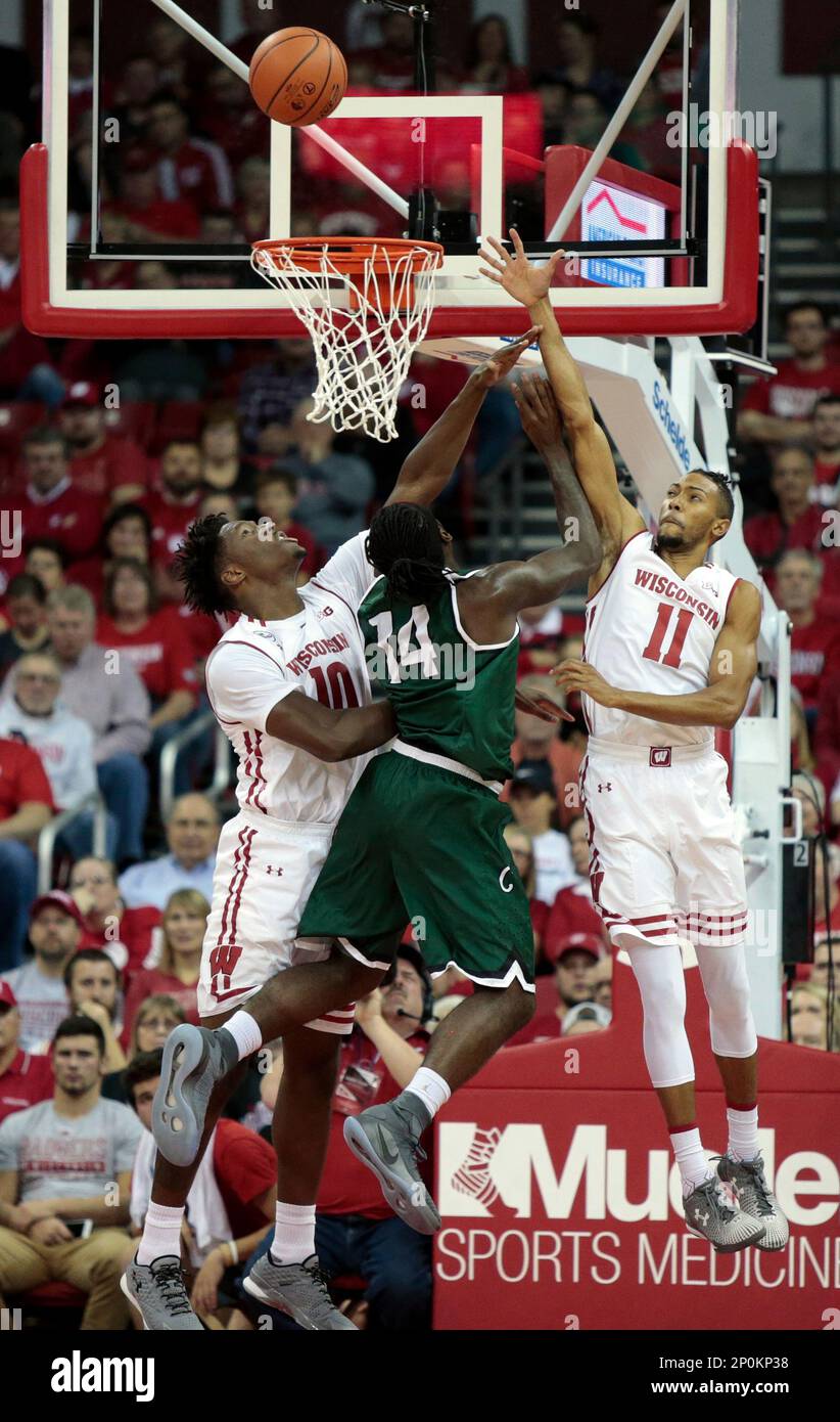 Chicago State guard Fred Sims Jr. (14) shoots over Wisconsin forward ...
