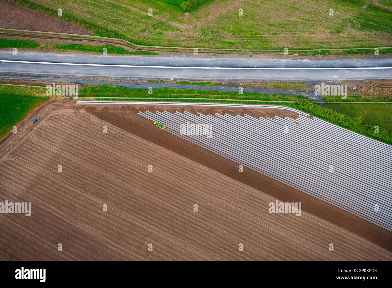 motorway construction farmland plastic sheeting Stock Photo - Alamy
