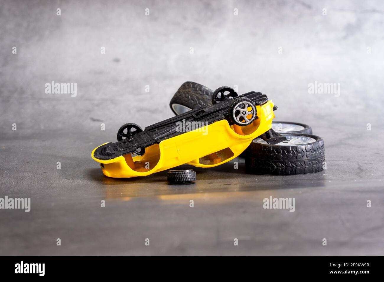 toy car model accident in overturned composition with side view ...