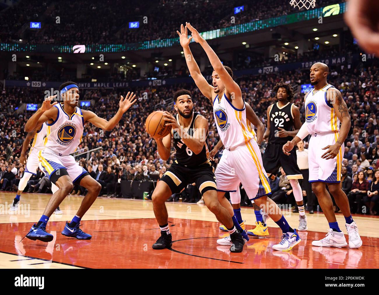 Toronto Raptors guard Cory Joseph (6) is defended by Golden State ...
