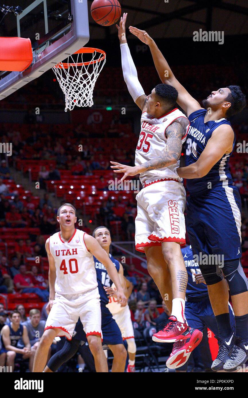 Utah forward Kyle Kuzma (35) shoots in front of Concordia's Tre Vance ...