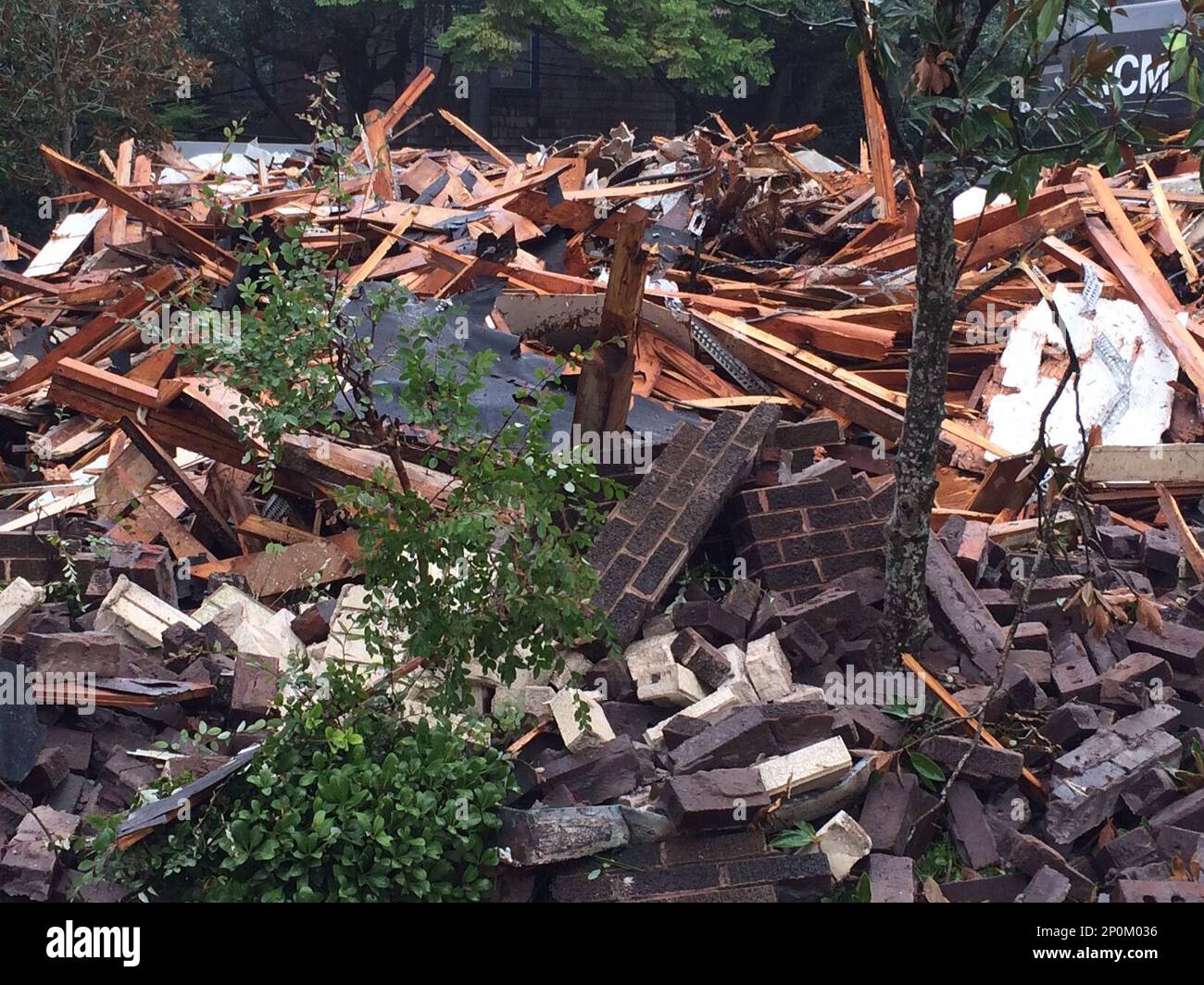 Rubble from the demolished Josephine Apartments is seen on Tuesday ...